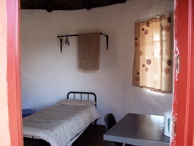 Earthwatch_rondavel_interior – Kalahari Meerkat Project
